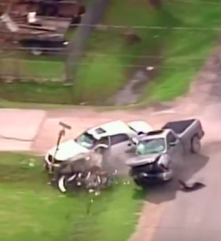 VIDEO: Carjacking Suspect Flies Out of Stolen Vehicle After Police ...