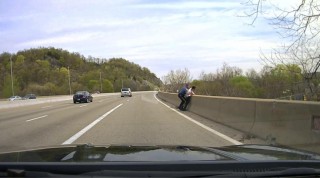 WATCH: Cop Tackles Suicidal Man to Stop Him From Jumping Off Bridge ...