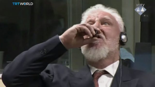 Convicted War Criminal Swallows Fatal Poison in Court After Verdict ...
