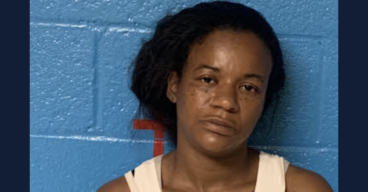 Synkel Davis charged after police find baby boy in suitcase